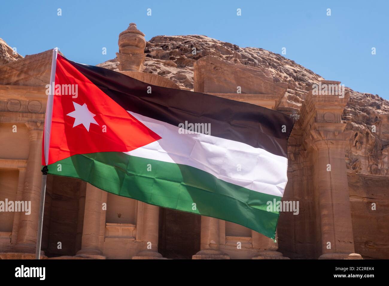 The Jordan flag in Petra' Stock Photo - Alamy