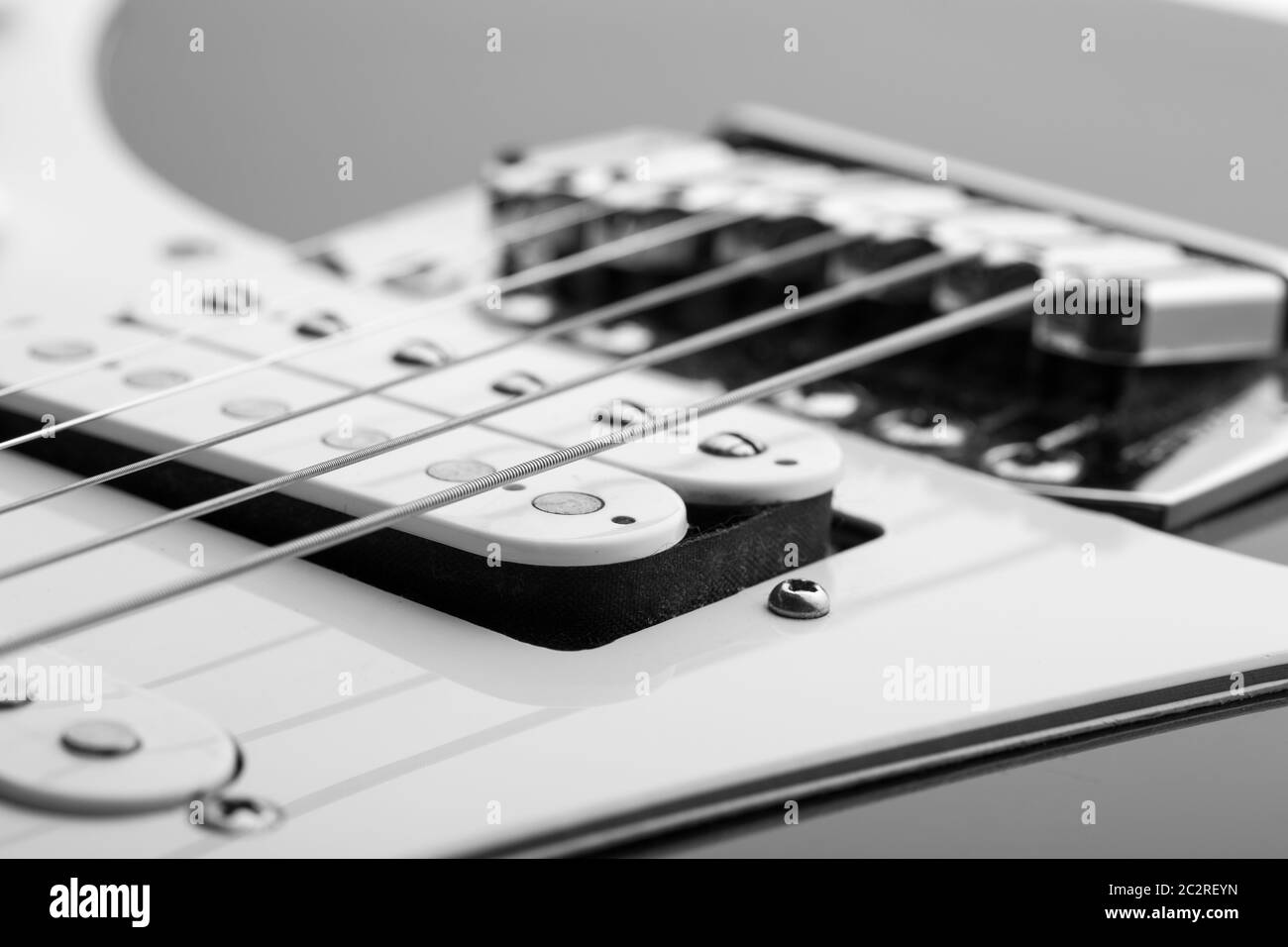 Closeup of strings on electric guitar Stock Photo - Alamy