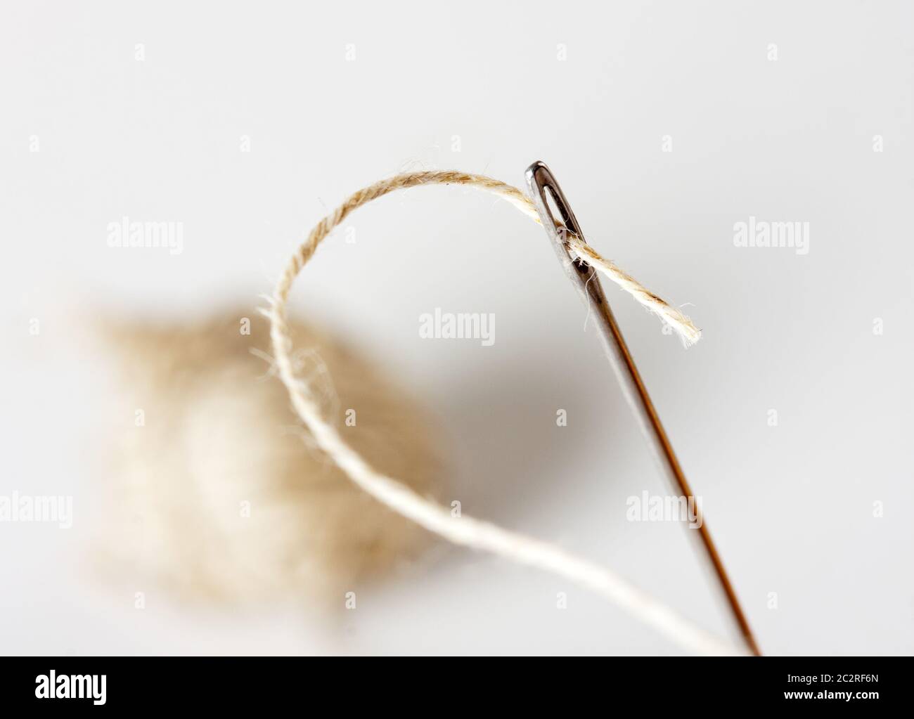 Threaded needle on white hi-res stock photography and images - Alamy