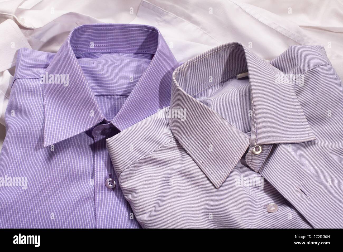 Two blue shirt hi-res stock photography and images - Alamy