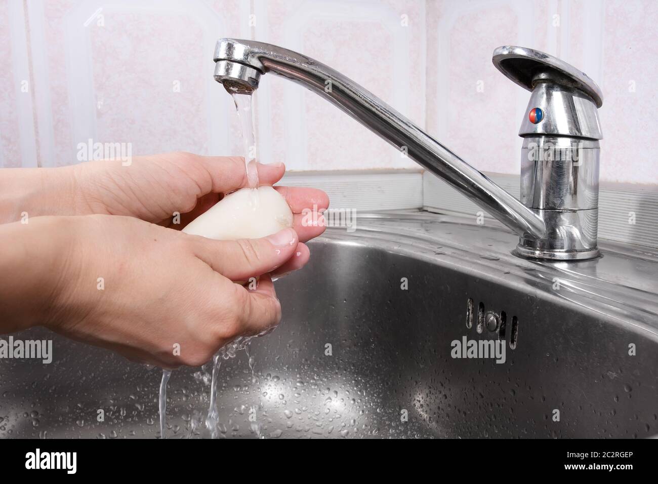 Woman washing hands water soap hi-res stock photography and images - Alamy