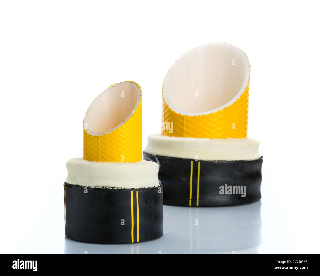 Two pipes of different size isolated on white Stock Photo - Alamy