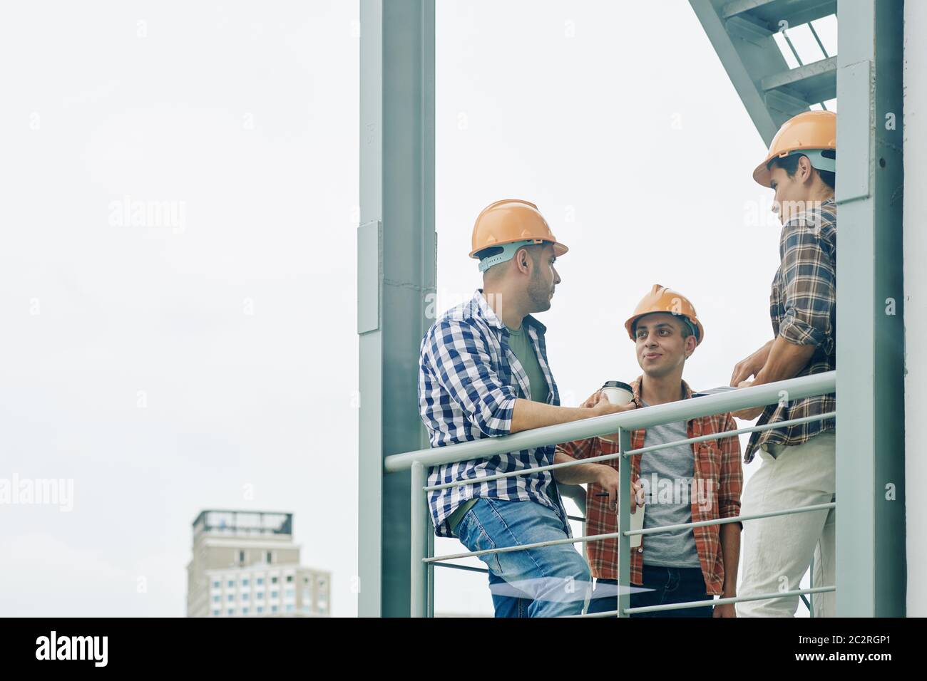 Construction drinking coffee construction site hi-res stock photography ...