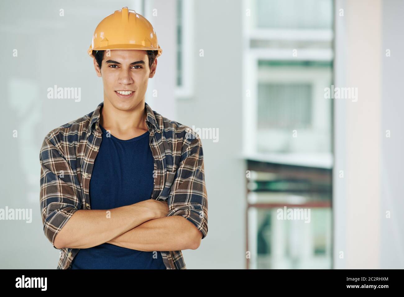 Waist up portrait of handsome construction engineer wearing casual ...