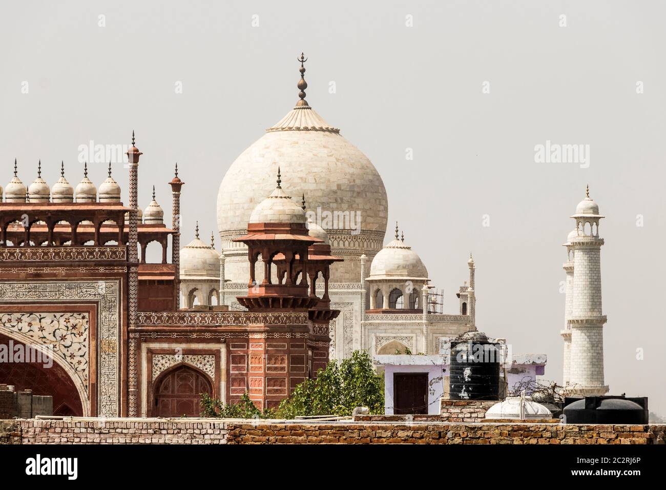 Taj Mahal in Agra, India. Mogul marble mausoleum with minarets, mosque ...