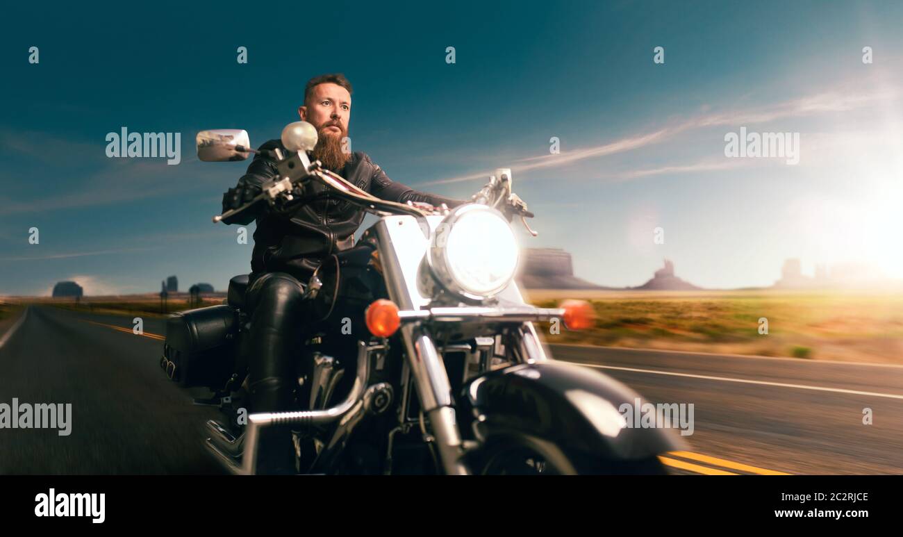 Biker riding on chopper, night road adventure in desert valley. Vintage ...