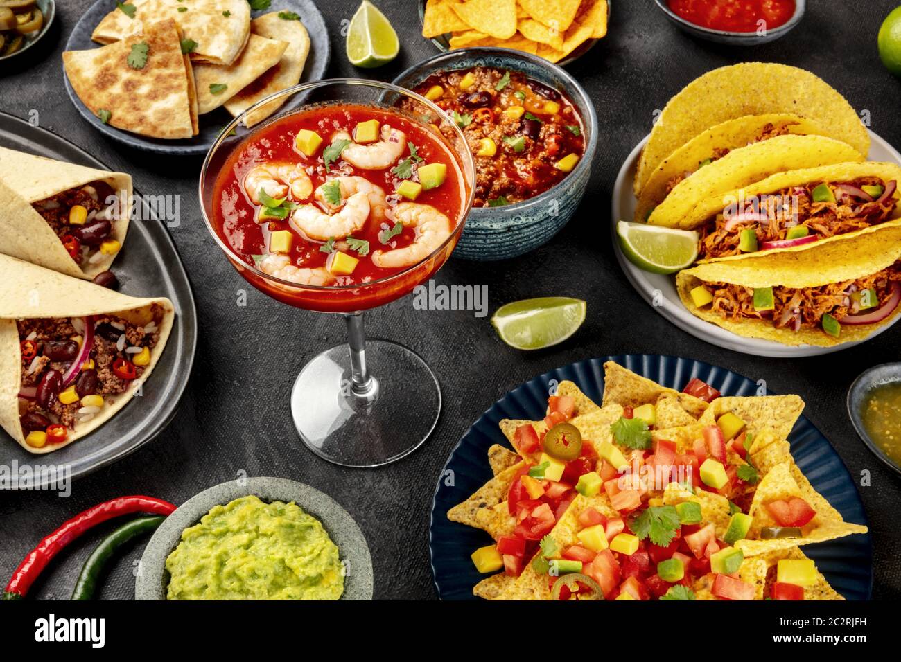 Mexican food, many dishes of the cuisine of Mexico on a black ...