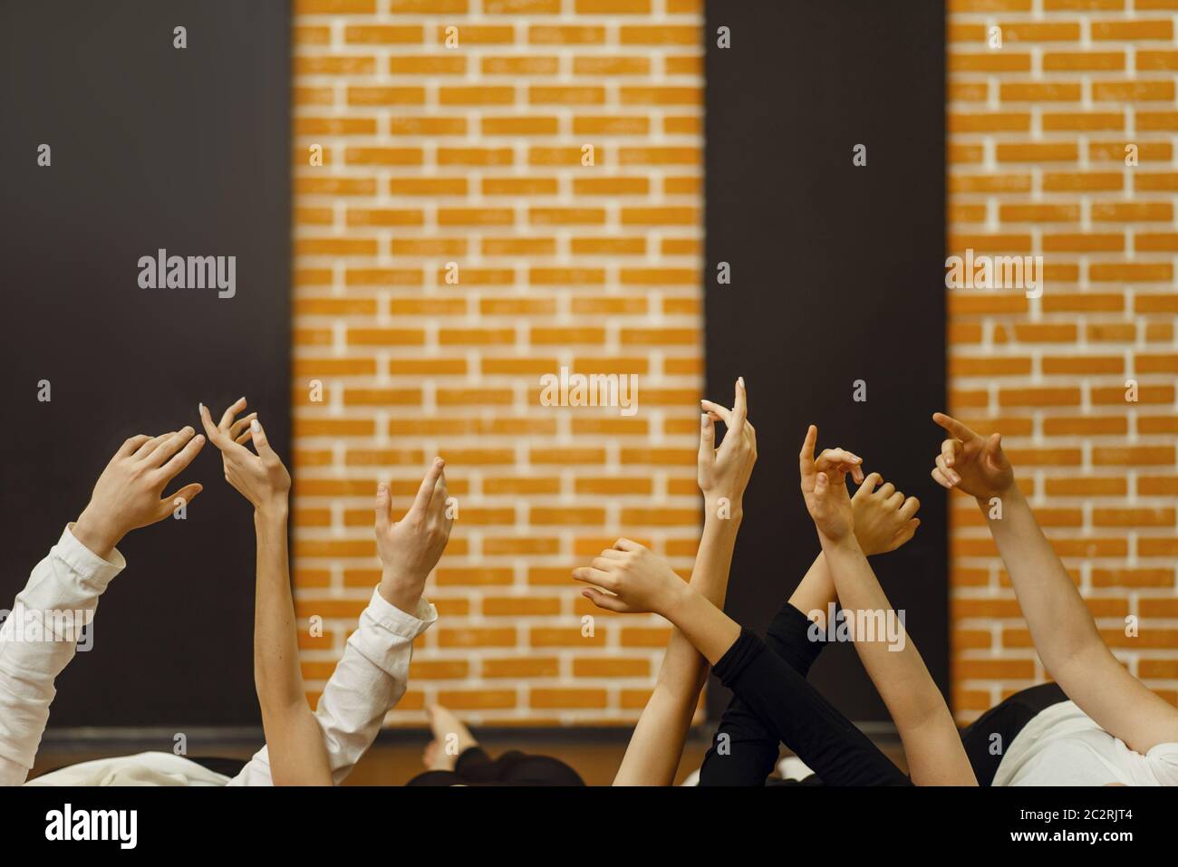 Contemporary dance performers hands in studio. Female and male dancers ...