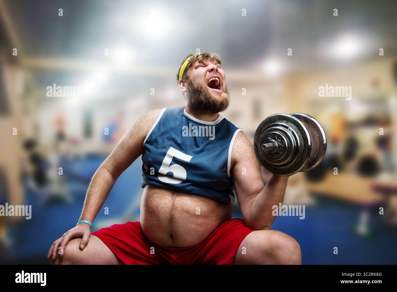Fat man do hard exercises with a dumbbell in the gym Stock Photo - Alamy