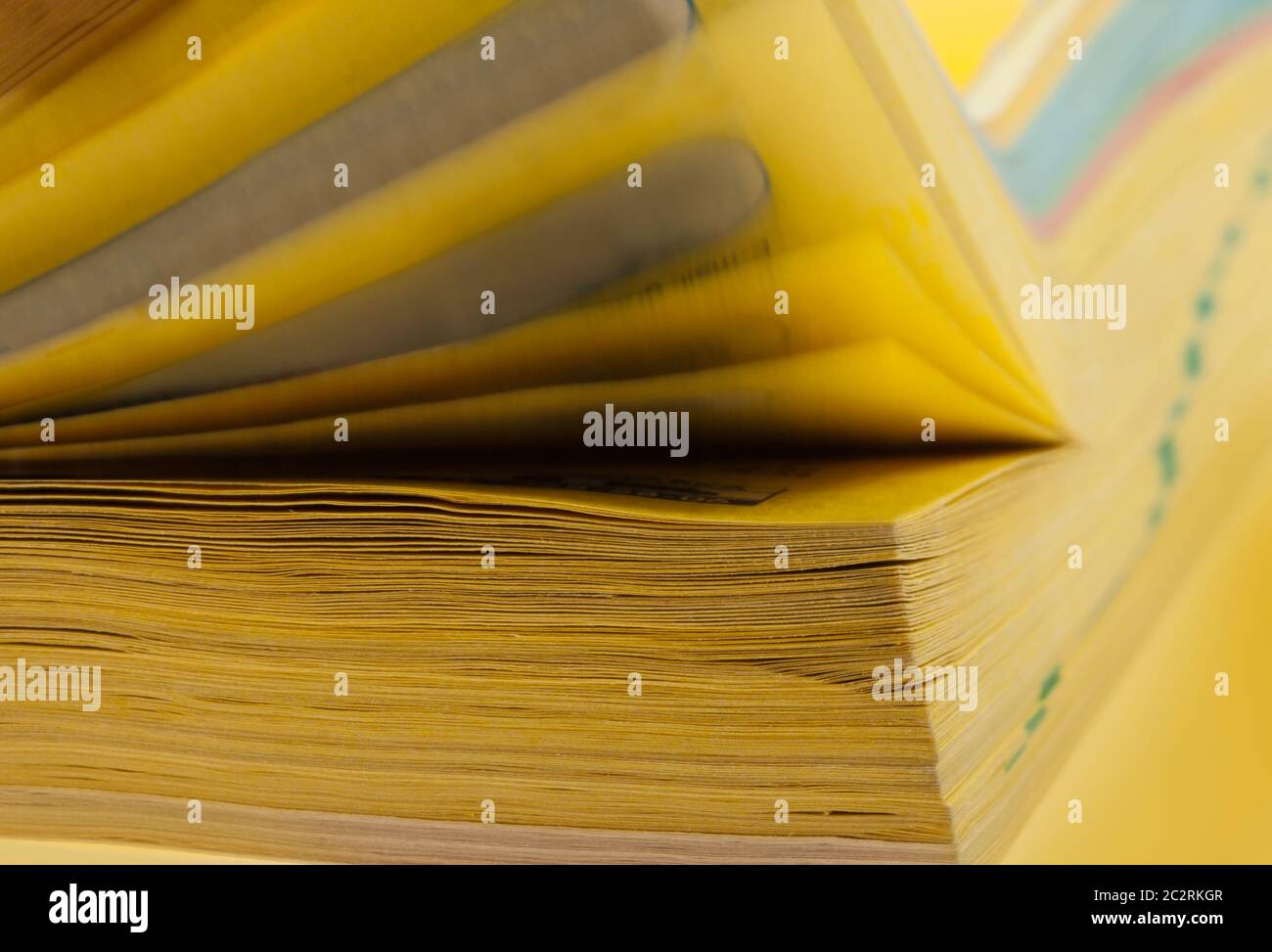 Scrolling pages of thick book. Close-up view Stock Photo - Alamy