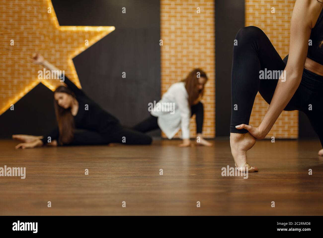 Contemporary dance performers, workout in studio. Dancers training in ...
