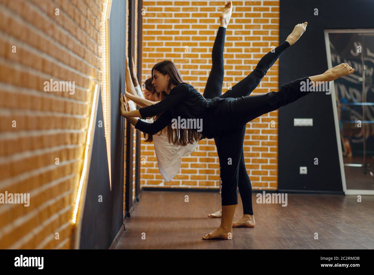 Contemporary dance performers, women on workout in studio. Dancers ...