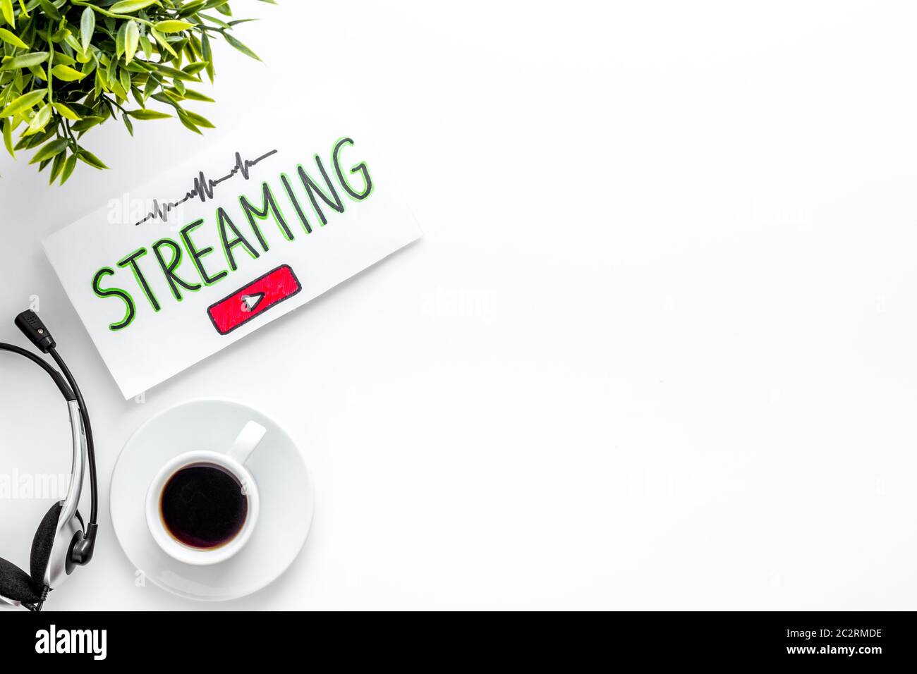 Online streaming social media concept. Paper tablet on office desk top ...