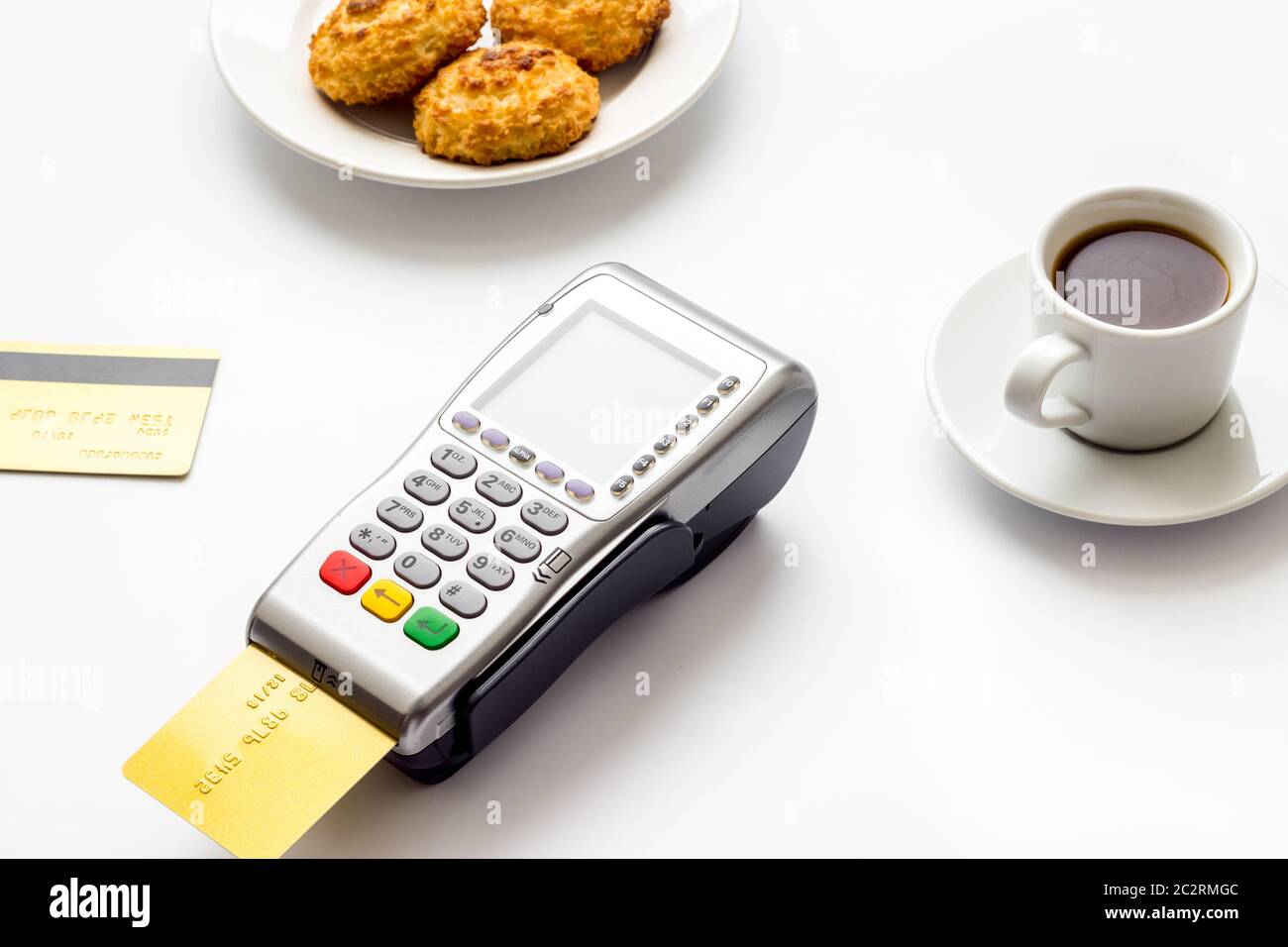 Payment transactions. Terminal and credit card on cafe white table ...