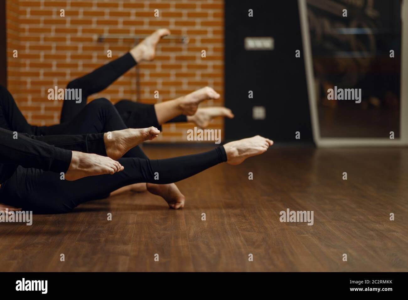 Female contemporary dance performers, legs flexibility, stretching ...