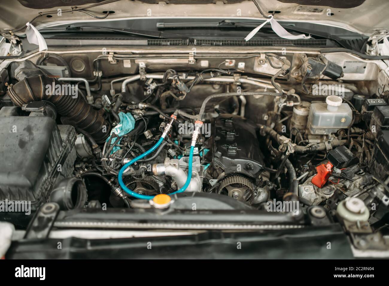 Car with opened hood, closeup view on engine, automobile service, motor ...