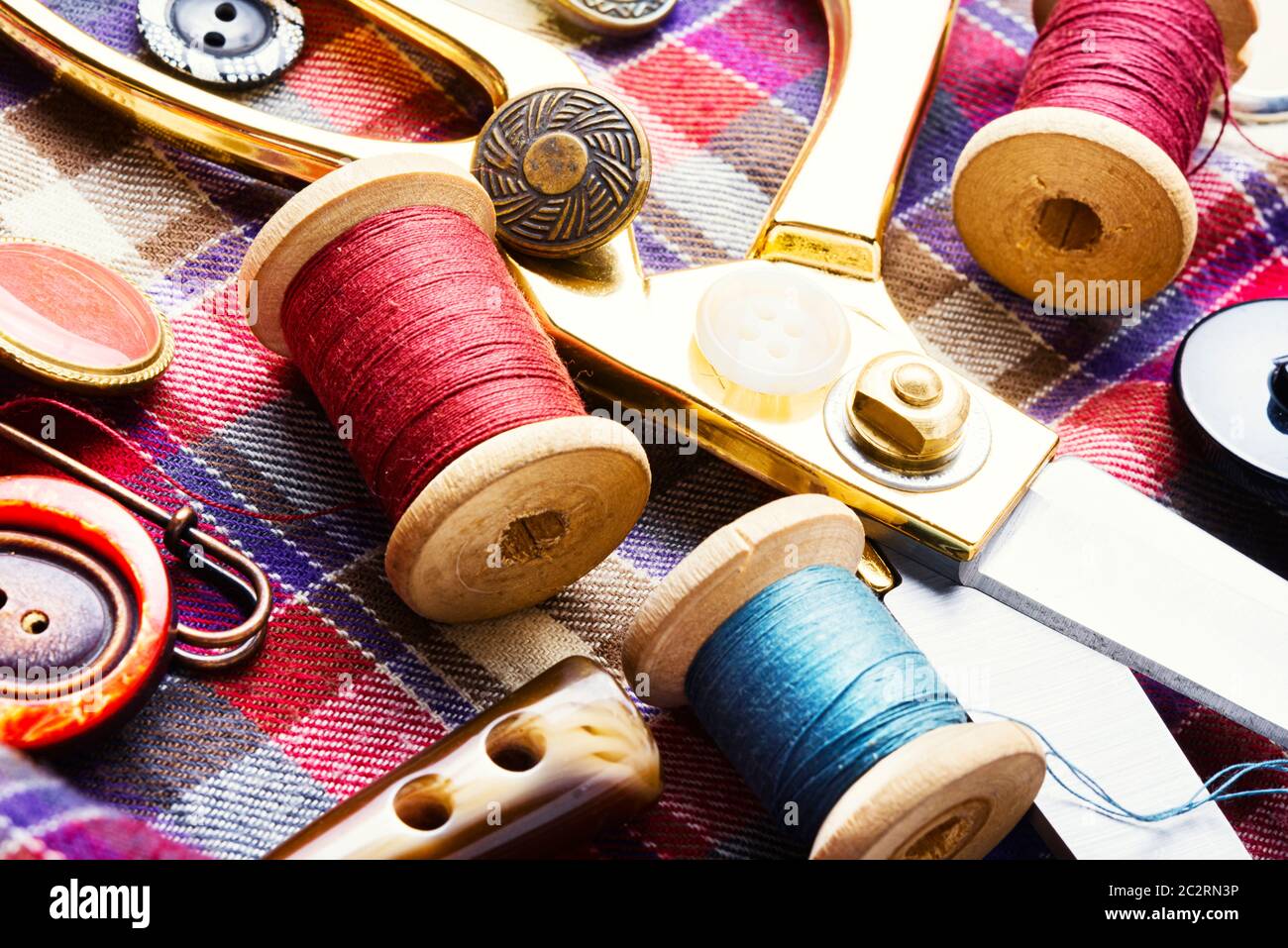 Sewing tools, scissors, buttons and threads on fabric.Sew Stock Photo ...