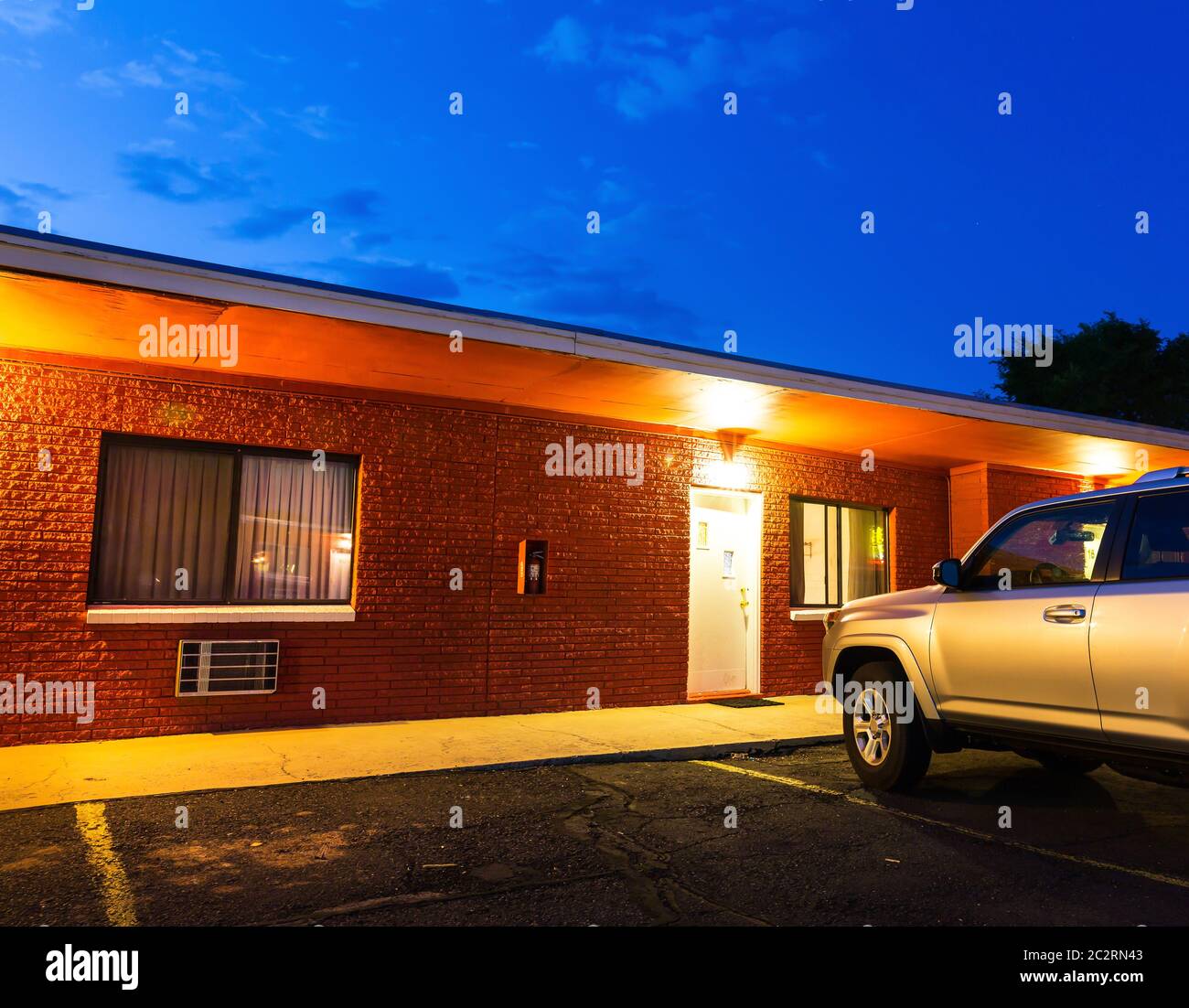 USA roadside motel in the night. Historic american car travel routes ...