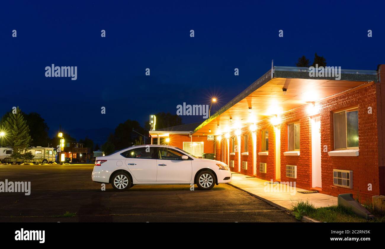 USA roadside motel in the night. Historic american car travel routes ...