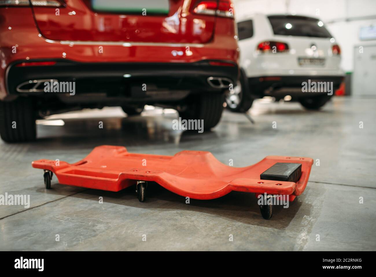 Rolling trolley for work under the bottom of the car in auto-service ...