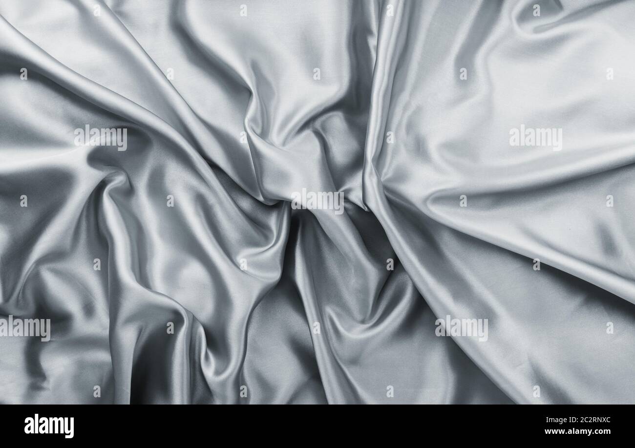 Beautiful elegant grey rumple satin fabric Stock Photo - Alamy