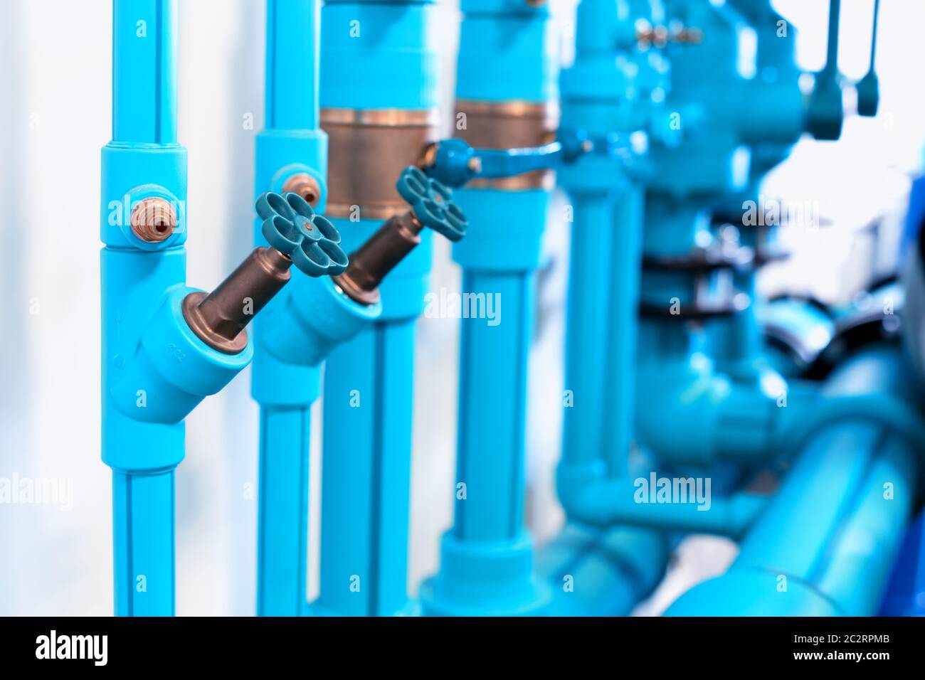 Pipes and valves of heating system Stock Photo - Alamy