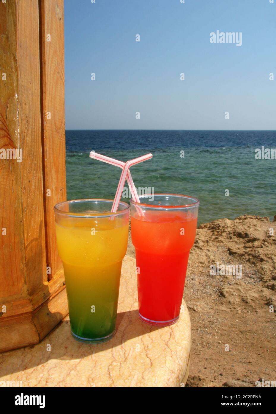 Two cocktails on the beach Stock Photo - Alamy