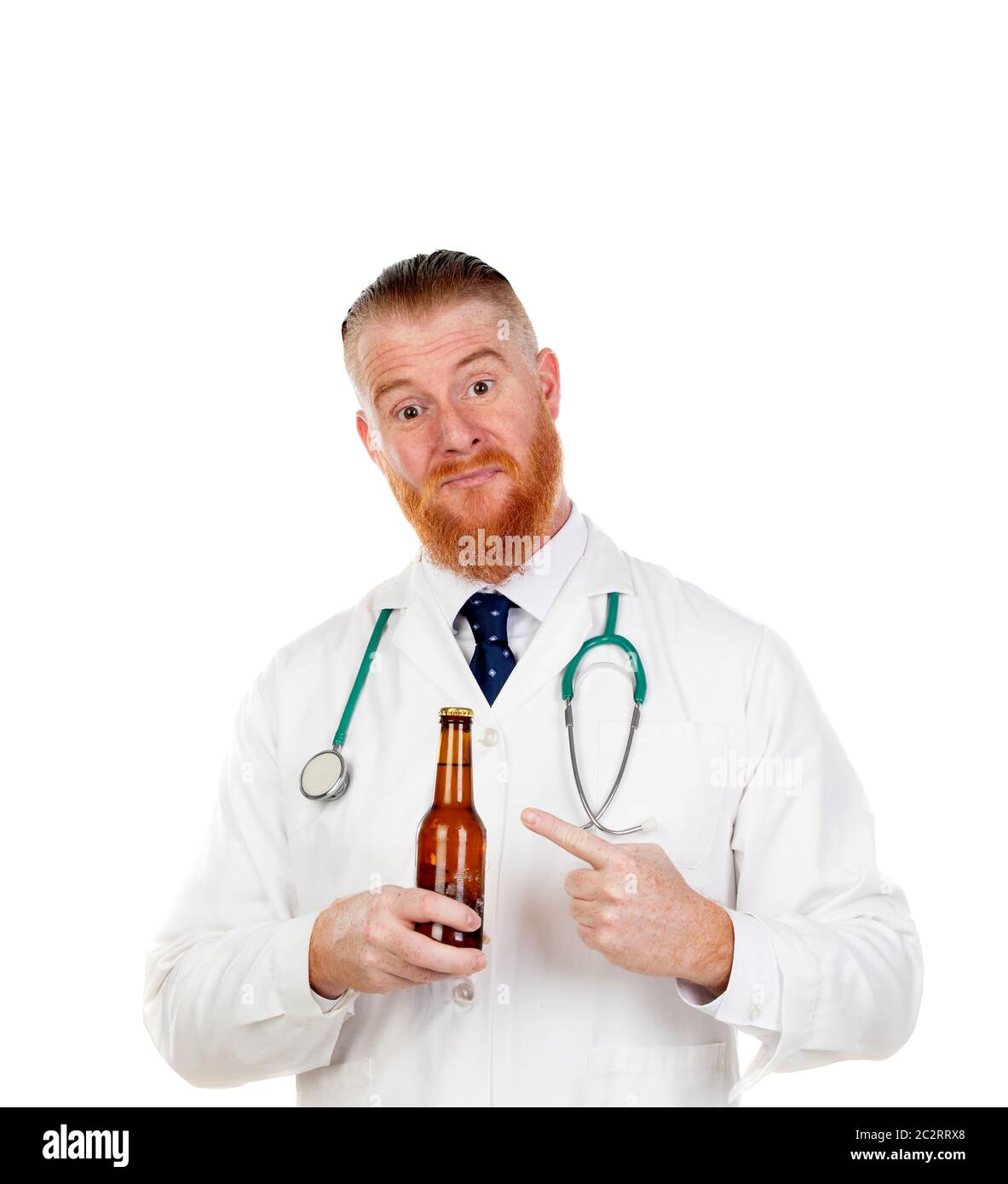 Redhead doctor with a bottle of beer isolated on a white background ...