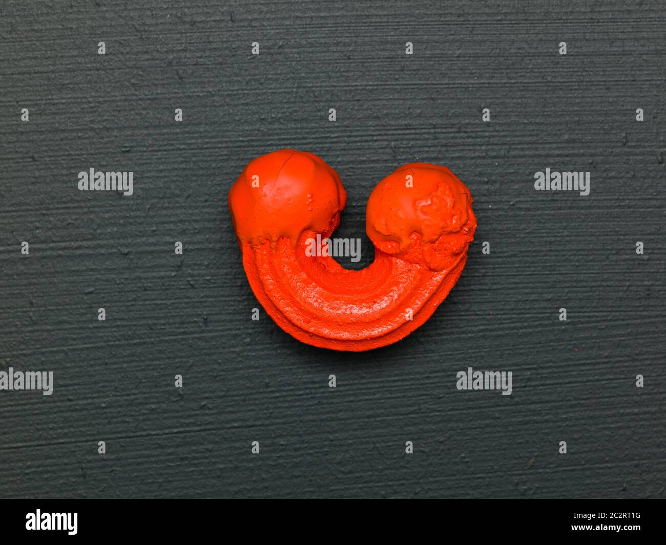 red christmas cookies on black wooden background from above Stock Photo ...
