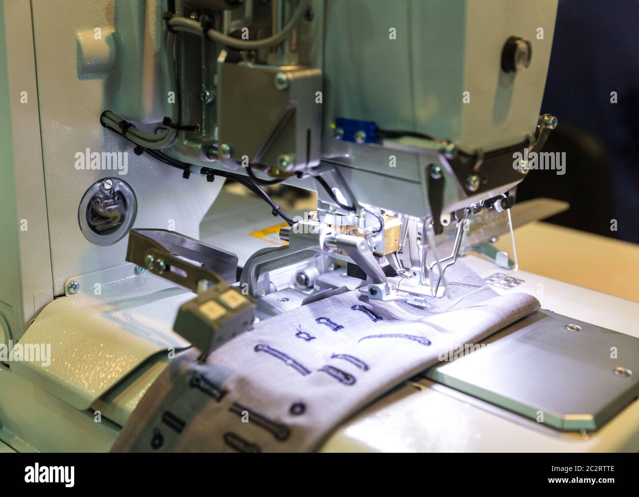 Sewing machine closeup, nobody, clothing sew. Textile fabric. Factory ...