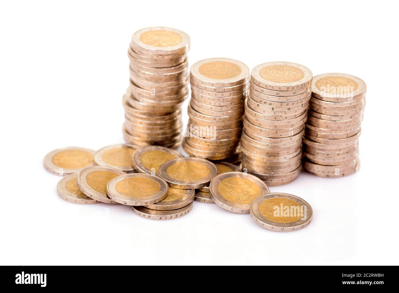 Heap of two euro coins isolated on white background Stock Photo - Alamy