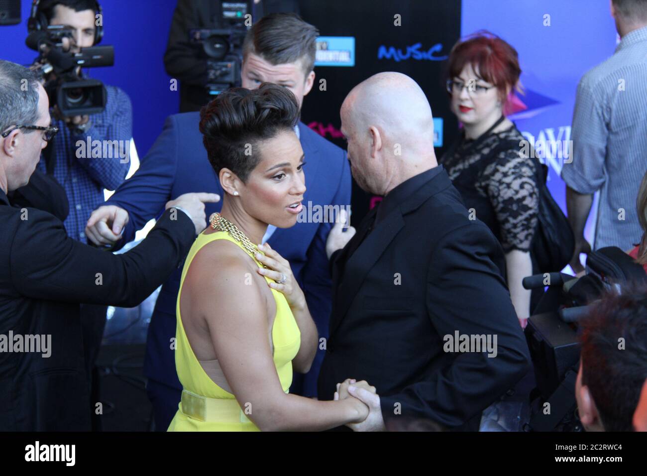 The security guard doesn’t miss an opportunity to hold hands with the ...