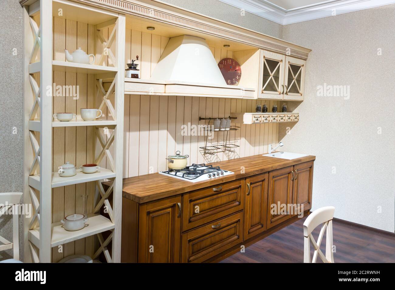 Modern refined kitchen interior with wooden furniture Stock Photo - Alamy