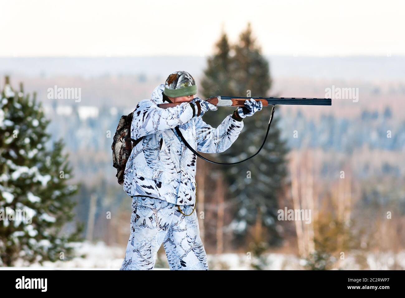 the hunter on winter hunting Stock Photo - Alamy