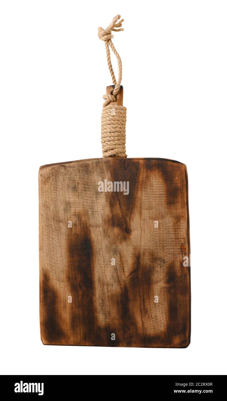 Rustic wooden cutting or serving board with handle isolated on white ...