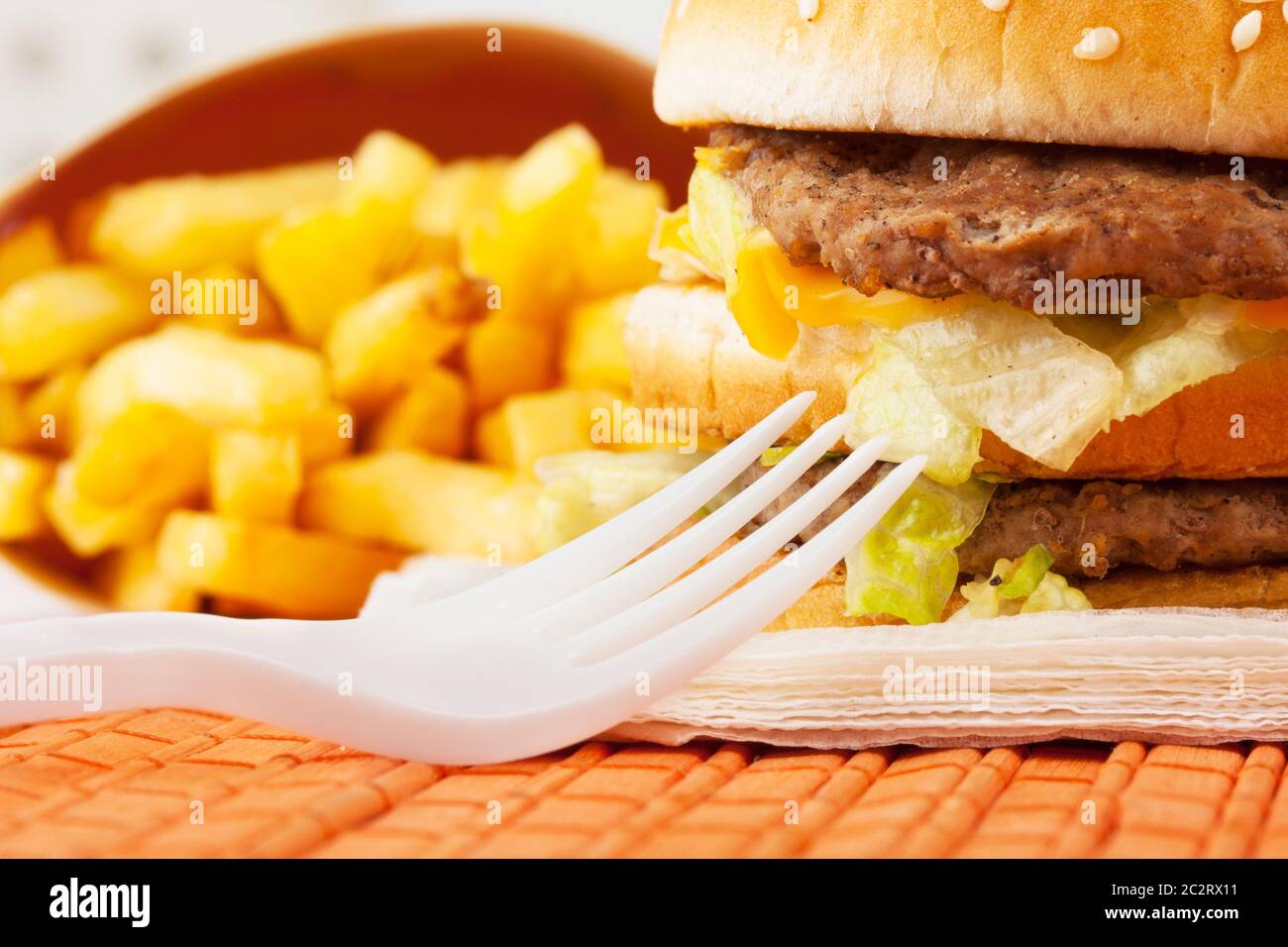 Fast food set of fried potatoes and burger Stock Photo - Alamy