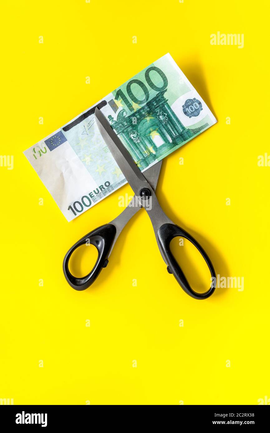 Decline of euro exchange rate. Scissors cut dollars banknote Stock ...