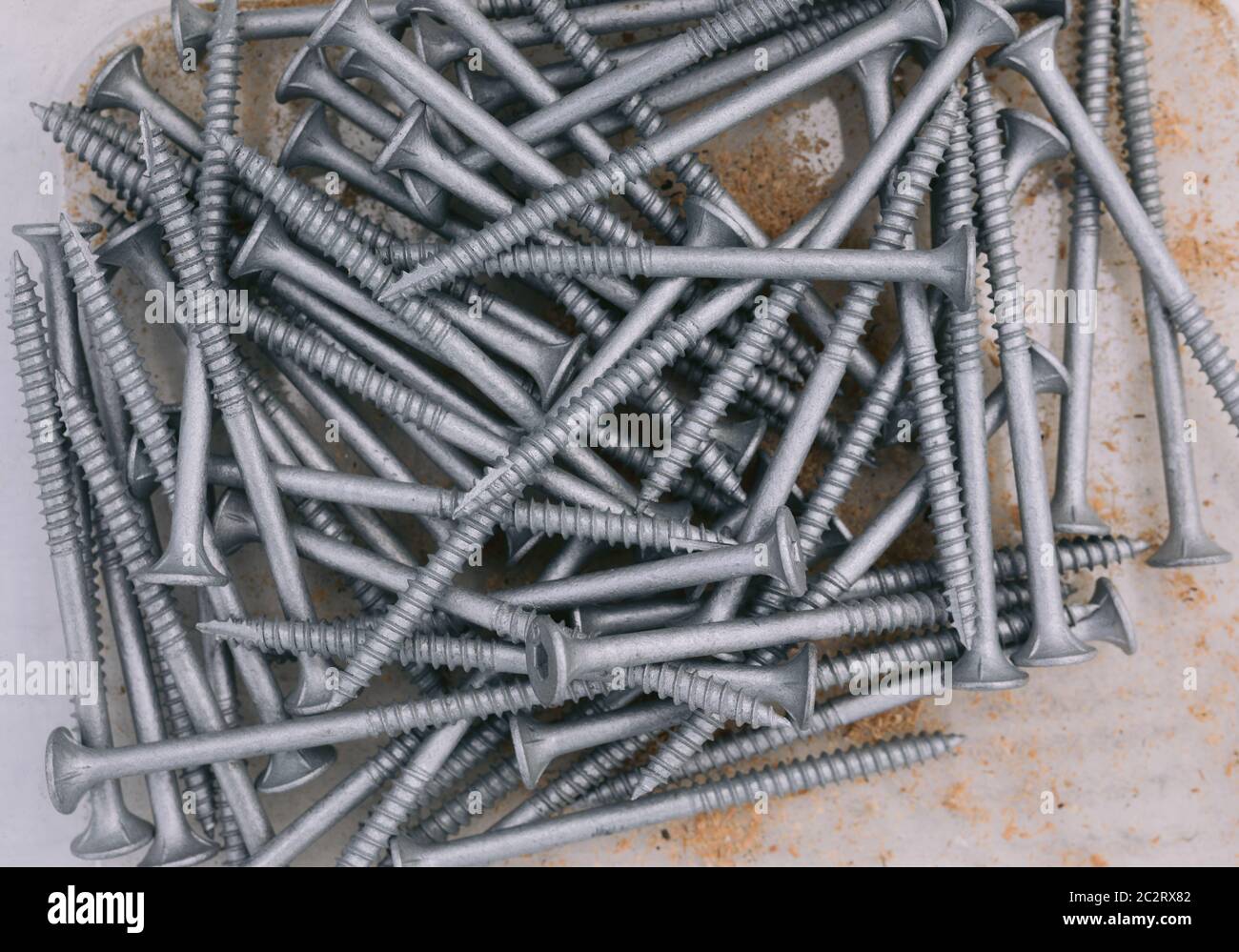 Bugle Batten Screws in box with saw dust scattered through box Stock ...