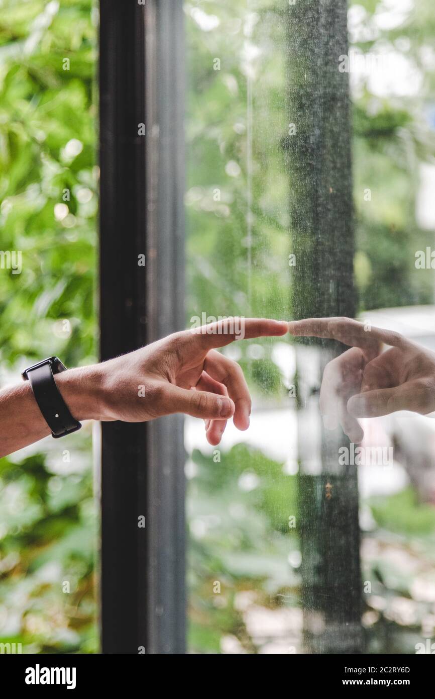 Hand touching glass hi-res stock photography and images - Alamy