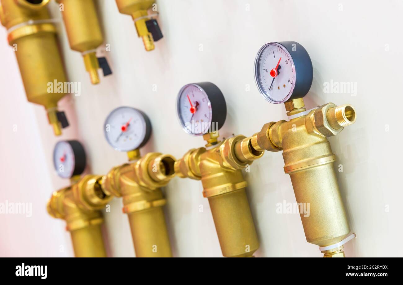 Filters with manometers for heater and water system Stock Photo - Alamy