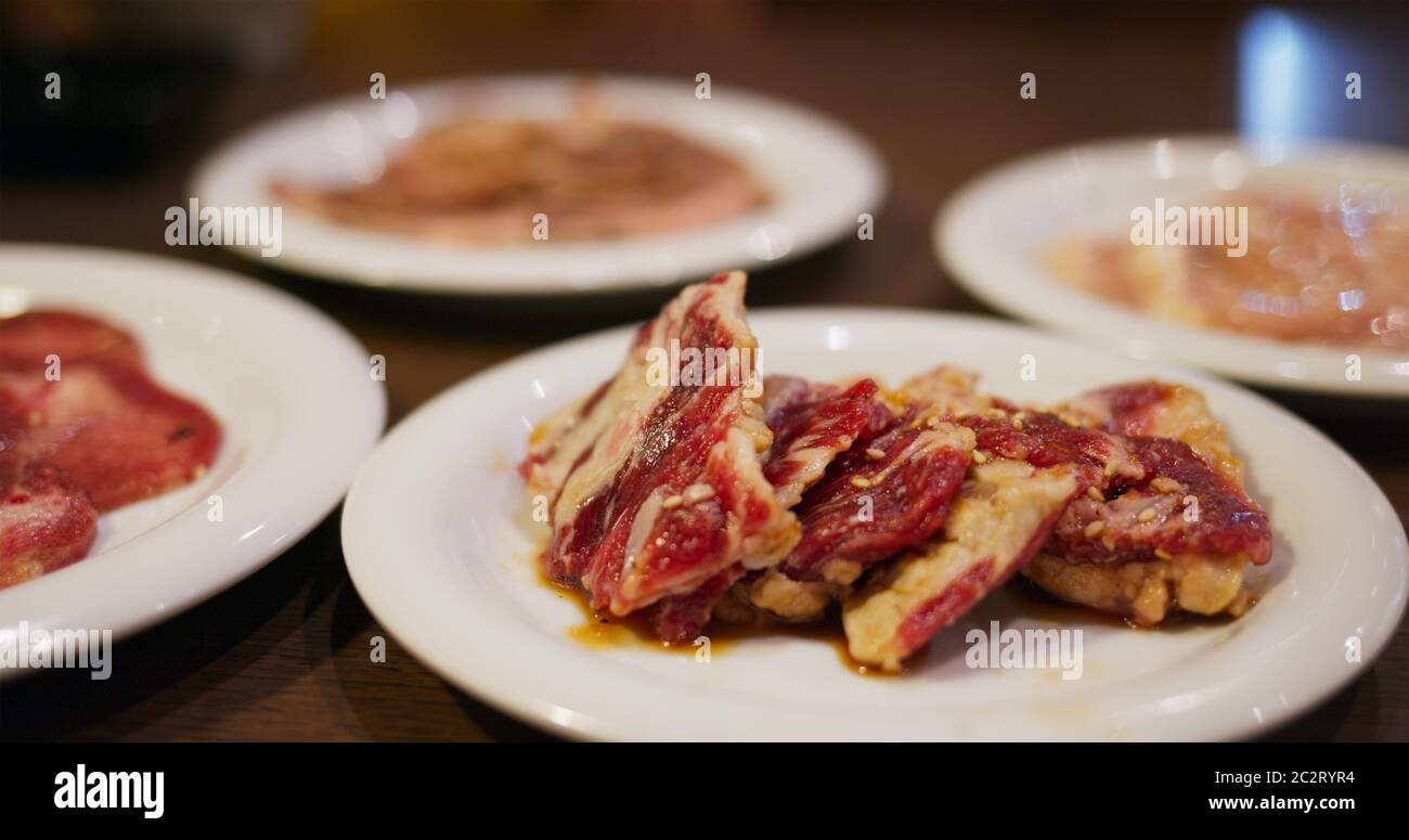 Japanese meat barbecue inside the restaurant Stock Photo - Alamy