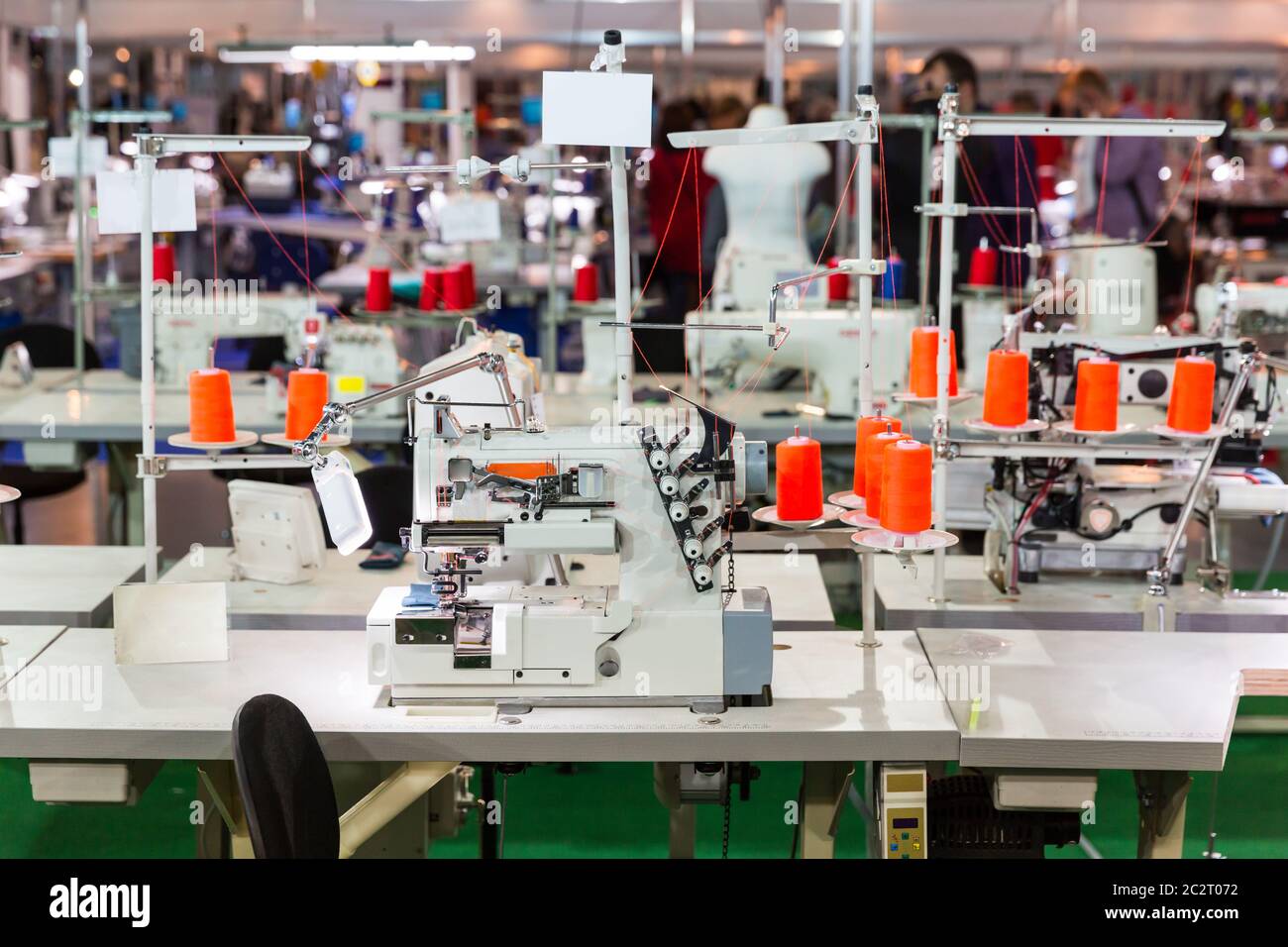 Sewing factory, nobody, overlock, stitching machines. Clothing sew ...