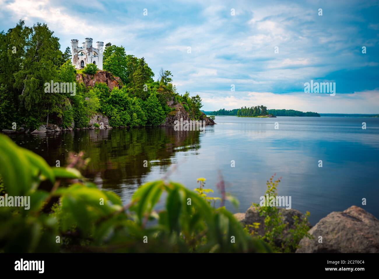 Forest on cliff over lake hi-res stock photography and images - Alamy