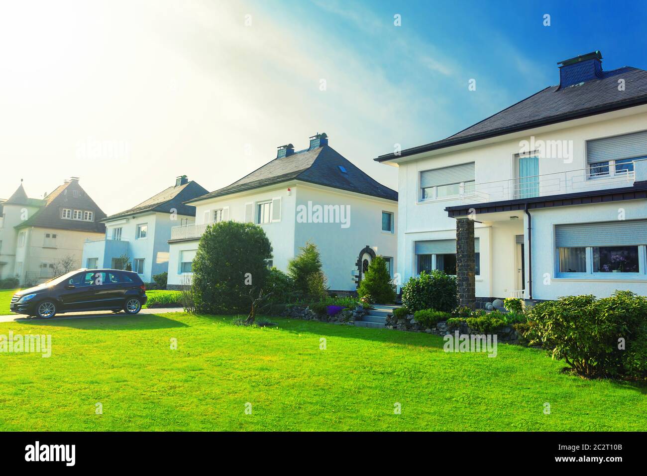 Row of few european suburban houses Stock Photo - Alamy