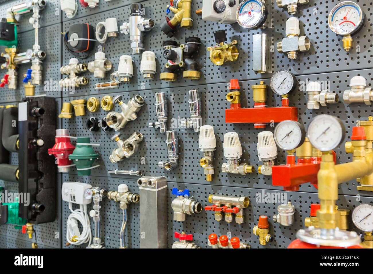 Plumbing equipment, pressure sensors and thermostat. Valves and tools ...
