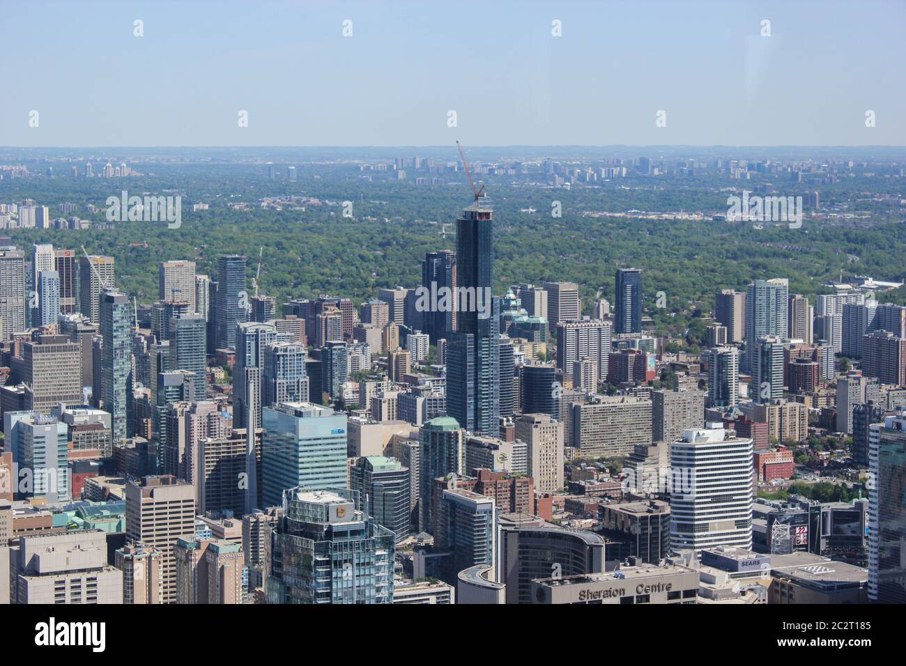Toronto cityscape from Cn Tower with buildings, streets, railways and ...