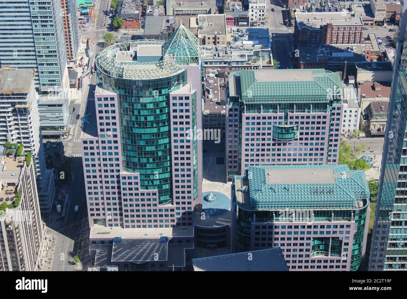 Toronto cityscape from Cn Tower with buildings, streets, railways and ...