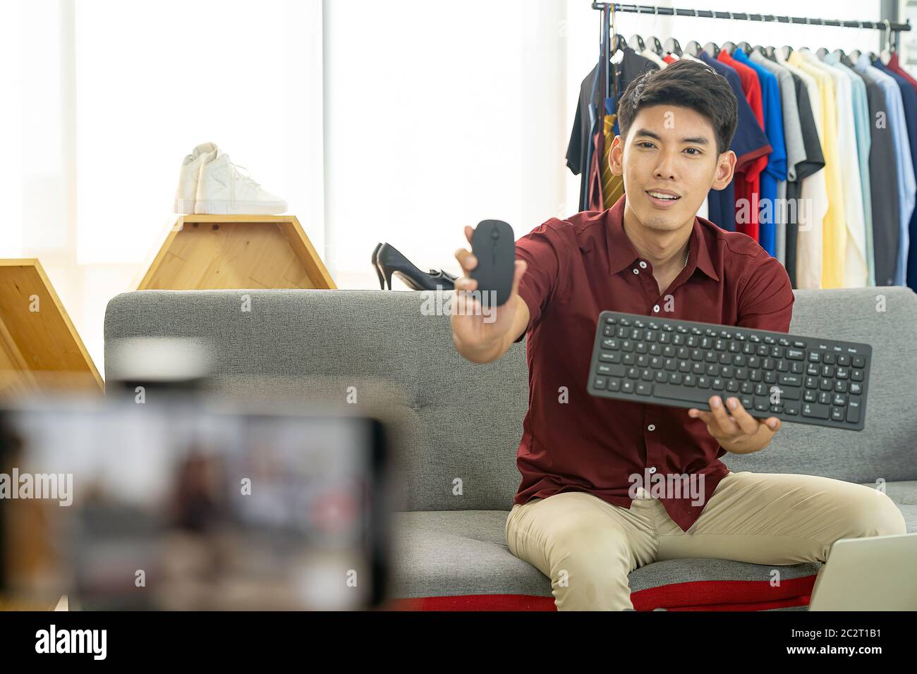 Vlogger live review IT product Stock Photo - Alamy