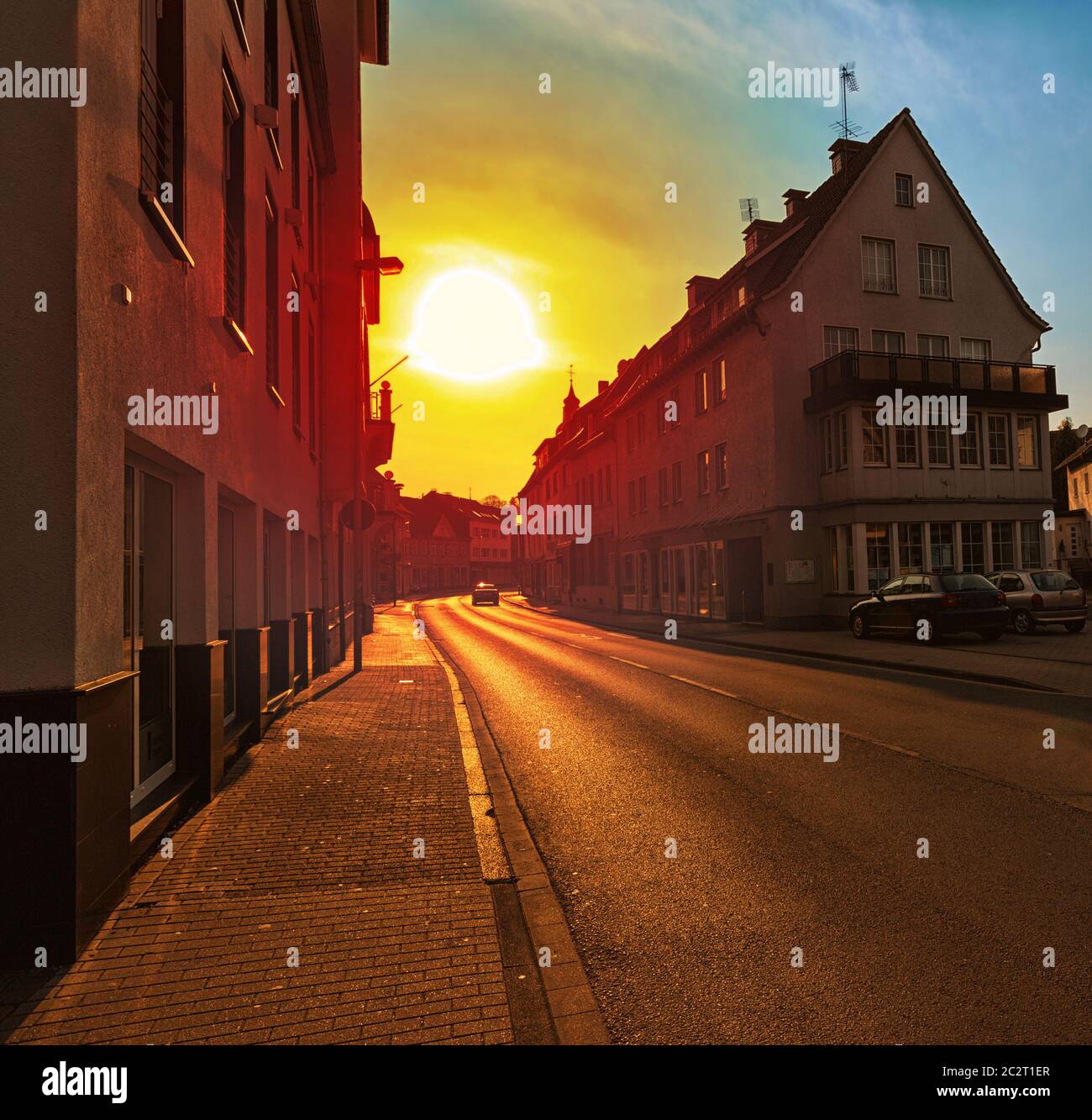 European suburban street at sunset Stock Photo - Alamy