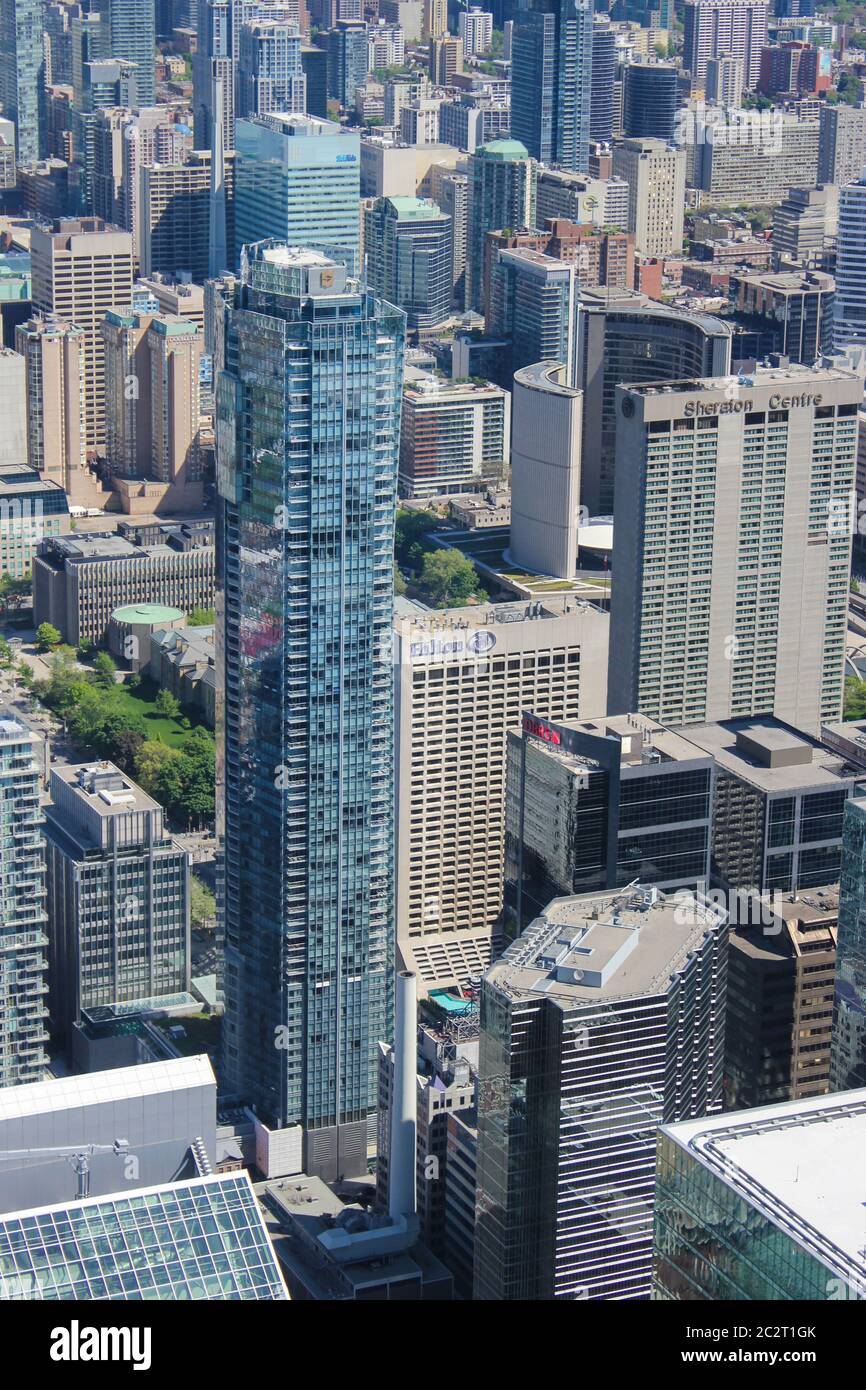 Toronto cityscape from Cn Tower with buildings, streets, railways and ...